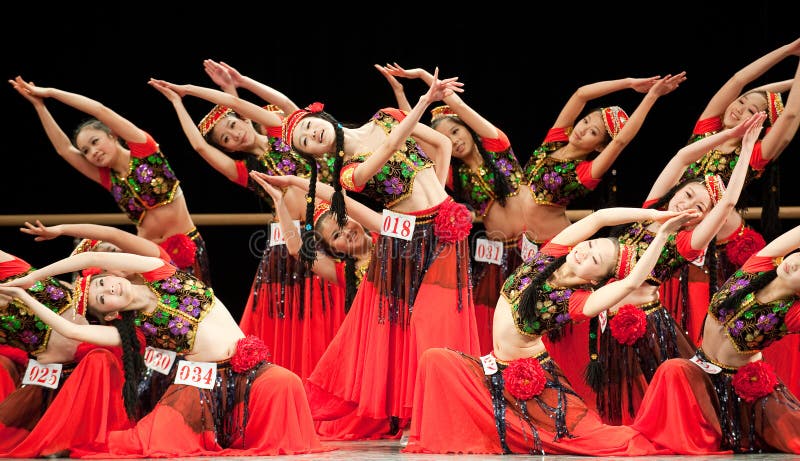 Dancing girls in red editorial stock image. Image of energy - 23130279