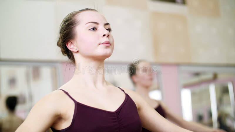 In Dancing Hall, Young Girls Ballerinas in Purple Leotards Hug, Smile ...