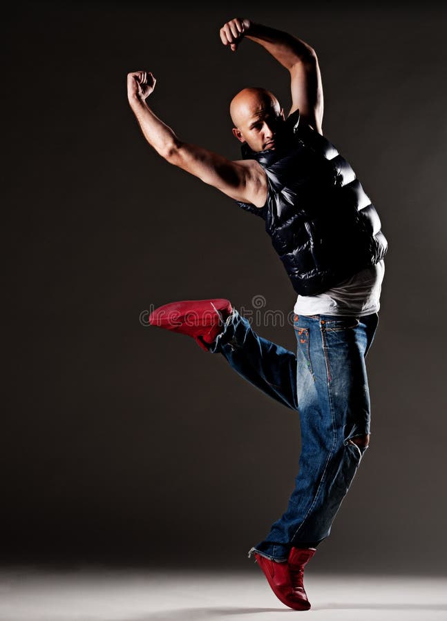 Hip-hop guy dancing stock image. Image of casual, sneakers - 16434163