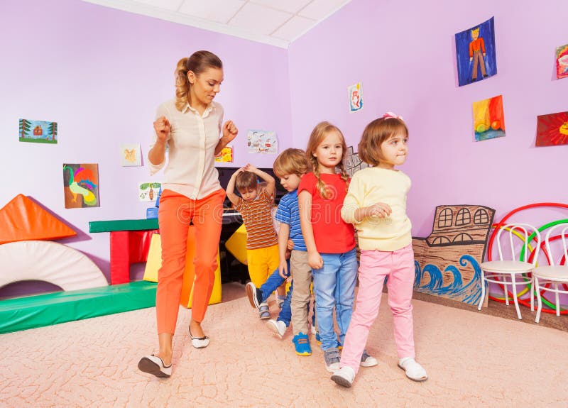 Dancing Lesson with Kids Repeat after Teacher Stock Image - Image of ...