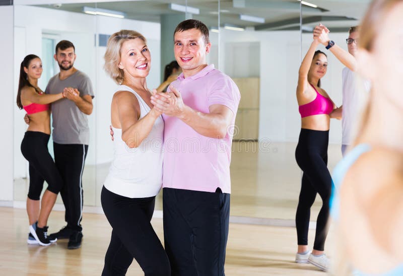 Dancing Couples Learning Salsa at Dance Class Stock Image - Image of ...