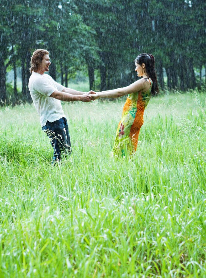 Woman Dancing in Summer Rain Stock Photo - Image of green, dancing ...