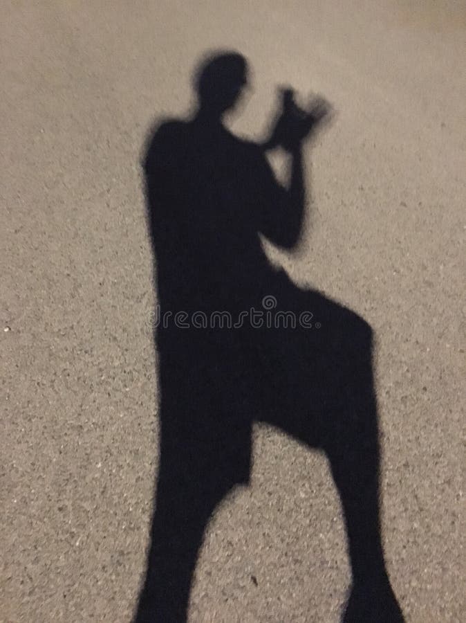 Dancing shadow stock photo. Image of black, street, shadow - 126628314