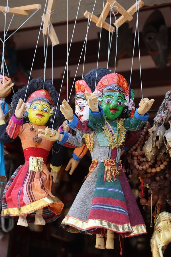 Dancing Strings: Vibrant Puppets Gracefully Suspended, Crafted Hanging ...