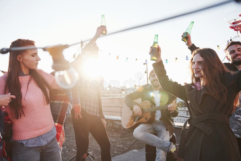 Dancing in Sunshine. Group of Young People Having Celebration at a ...