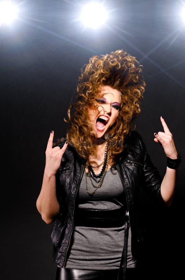 Dancing to the rock music stock image. Image of dancing - 21926421