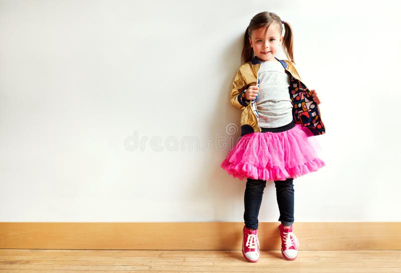 Dancing is a Way To Get the Little One Active. a Little Girl in a ...