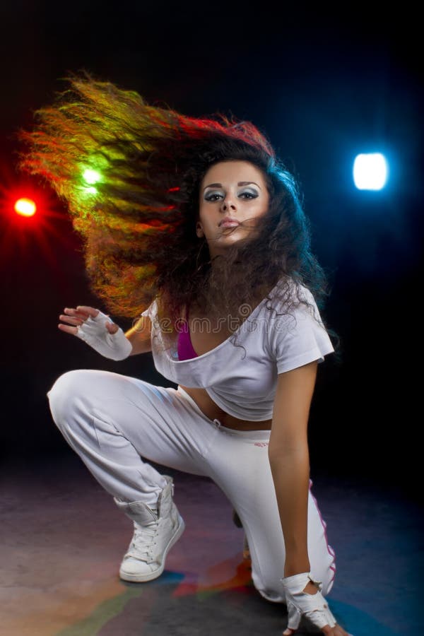Woman Dancing Under Spotlights Stock Photo - Image of dark, clubbing ...