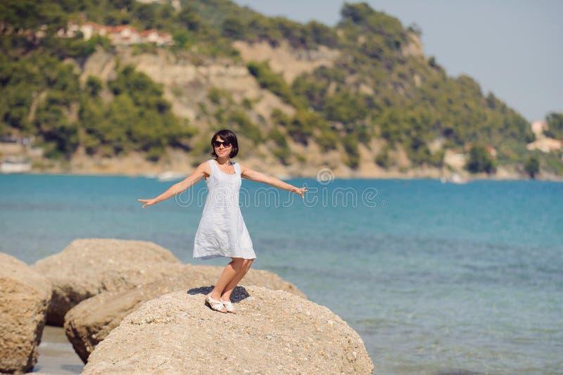 Dancing Woman on Stone stock photo. Image of model, cheerful - 42978900