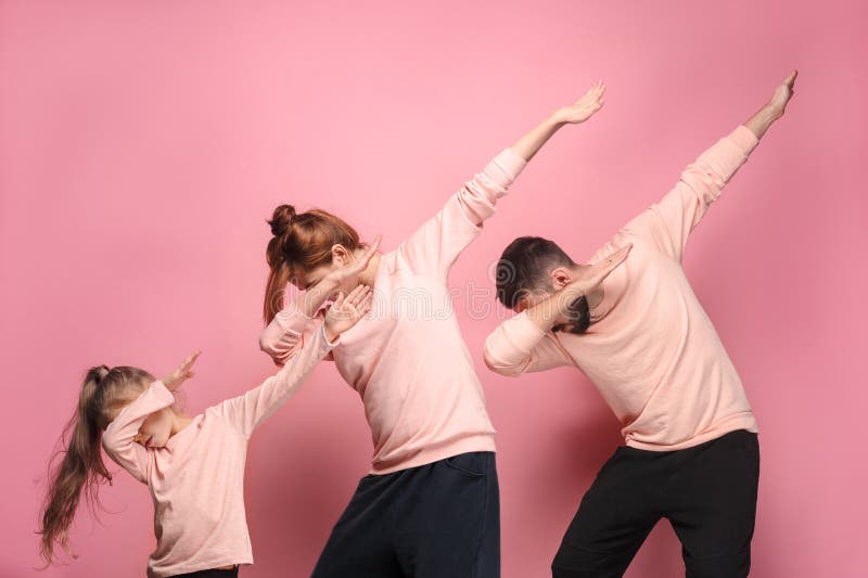 The Dancing Young Family on Pink Stock Photo - Image of emotional ...