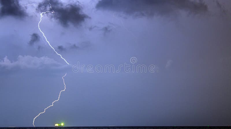 Lightning and Ships on the Horizon Stock Image - Image of rainbow, dusk ...