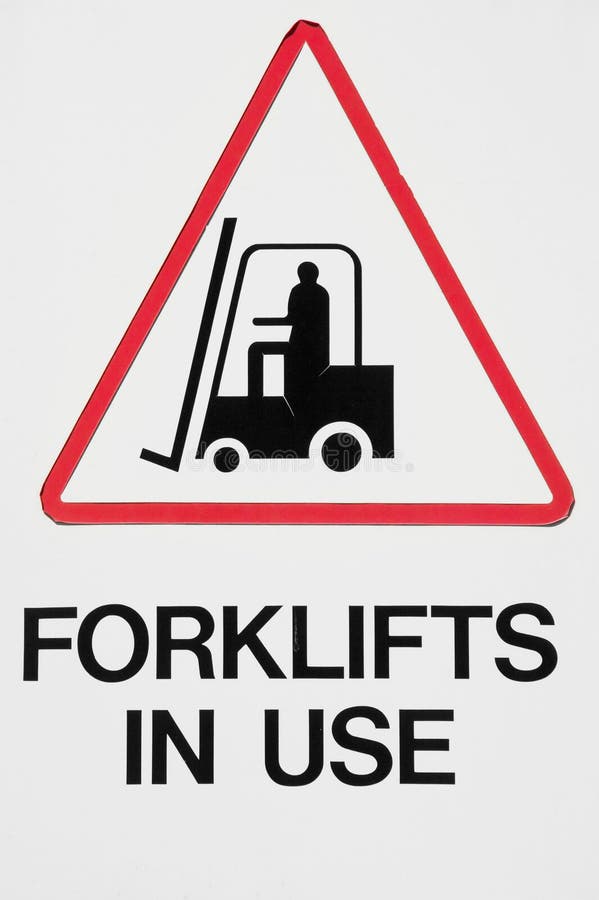 Danger, Forklifts in Use stock image. Image of shared - 6330235