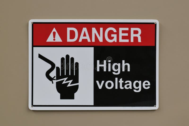 Danger High Voltage Safety Sign Warning Notice on Wall. Stock Photo ...