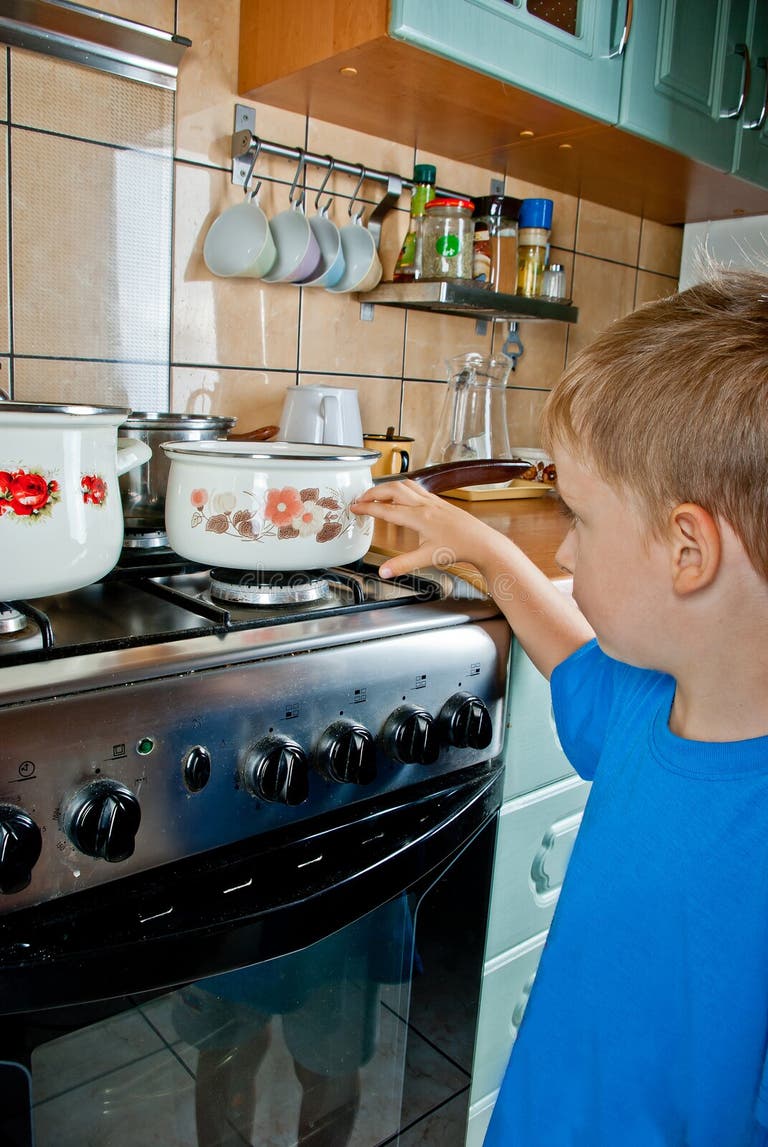 Child Touching Hot Stove Stock Photos - Free & Royalty-Free Stock ...