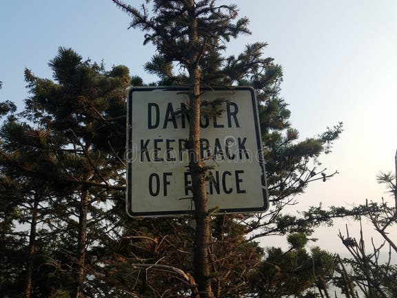 Danger Keep Back of Fence Sign in Tree Stock Image - Image of sign ...