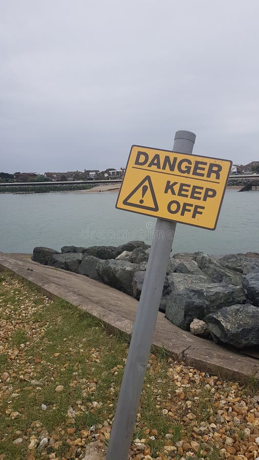 Danger Keep Off Sign beside Sea Harbour. Stock Photo - Image of ...