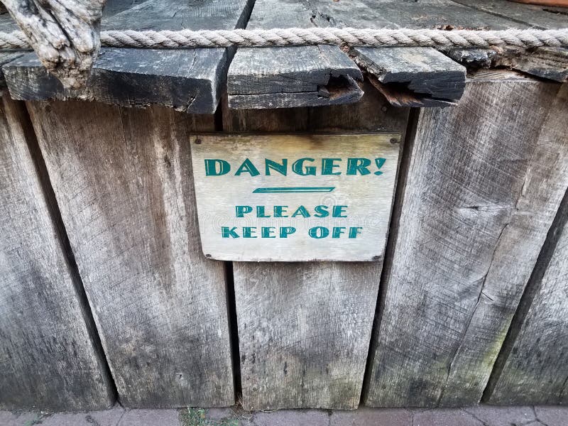 Danger Please Keep Off Sign on Brown Wood Stock Image - Image of ...