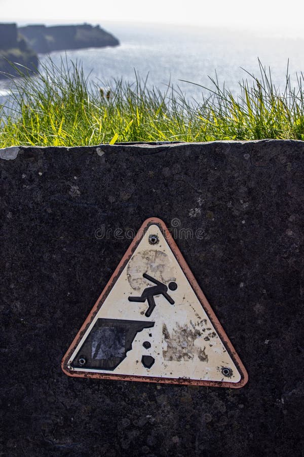 Danger! Risk of Falling Off a Cliff Stock Photo - Image of disintegrate ...