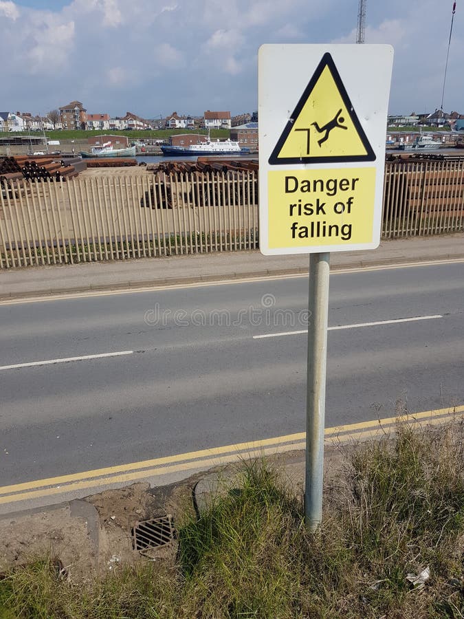 Danger Risk of Falling Warning Sign. Stock Image - Image of downtown ...
