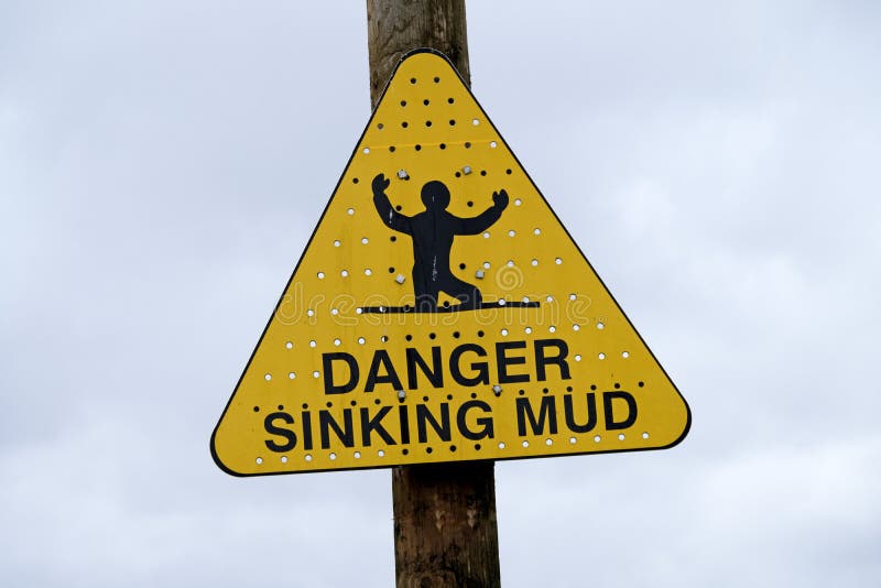 Warning Sign On Dangerous Mud Stock Image - Image of yellow, tide ...