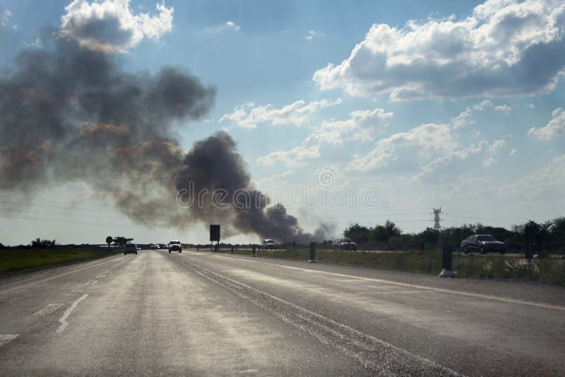 Danger Smoke Over Freeway with Sun from Front Stock Image - Image of ...