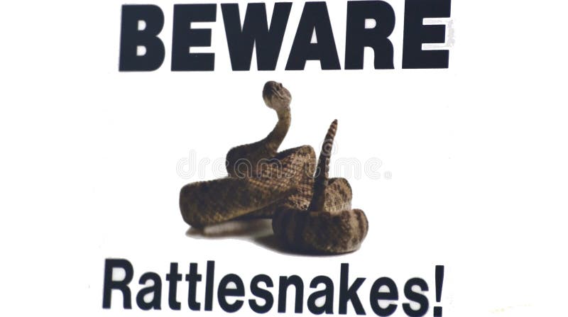 Danger Warning Beware of Rattlesnakes on a Sign Stock Photo - Image of ...