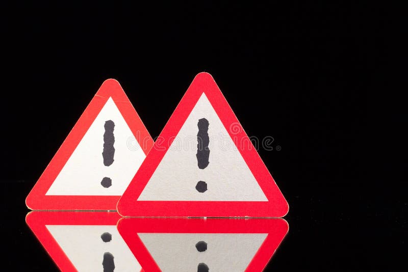 Danger Warning Signs On The Black Glass Desk Stock Photo - Image of ...