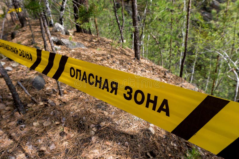 Danger Zone Sign in Cyrillic.Warning Sign in the Forest Stock Image ...