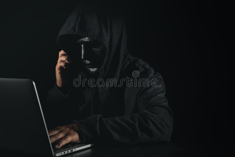 Dangerous Anonymous Hacker Man in Hooded and Mask Break Security Data ...