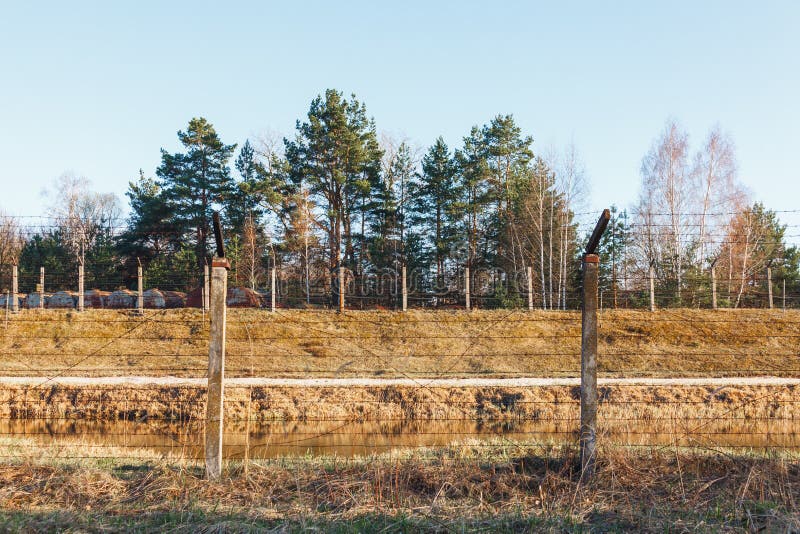 Dangerous Area Fenced with Barbed Wire Fence Stock Photo - Image of ...