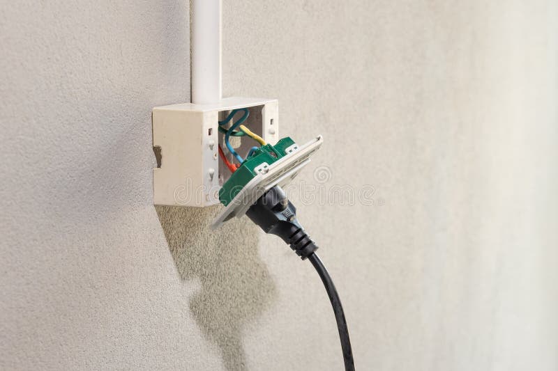 Dangerous Broken Electrical Socket Falling Out of Wall Stock Photo ...