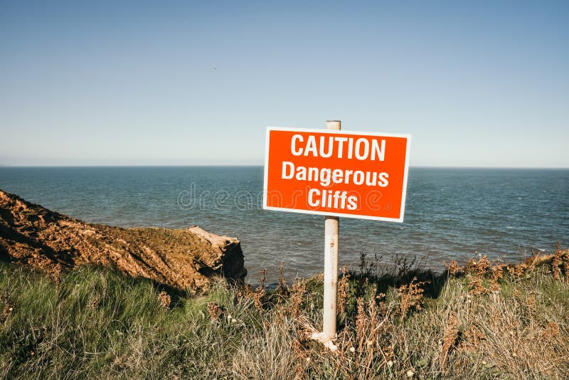 Dangerous cliff edge sign stock image. Image of cliff - 198671497