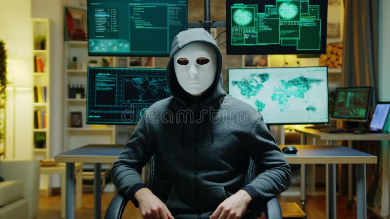Dangerous Hacker Hiding His Identity Wearing a White Mask Stock Footage ...