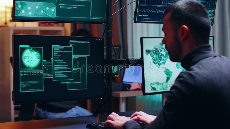 Dangerous Hacker Watching Multiple Monitors Stock Footage - Video of ...