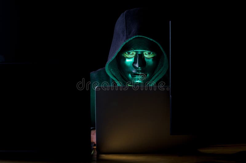 Dangerous Hooded hacker stock photo. Image of cybercrime - 195954786