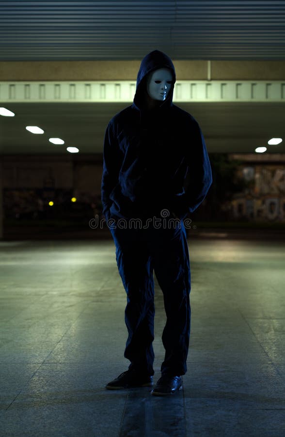 Dangerous man wearing mask stock photo. Image of blouse - 44384564