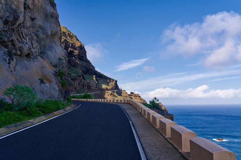 Dangerous Mountain Road on the Background of the Ocean Near the Cliff ...