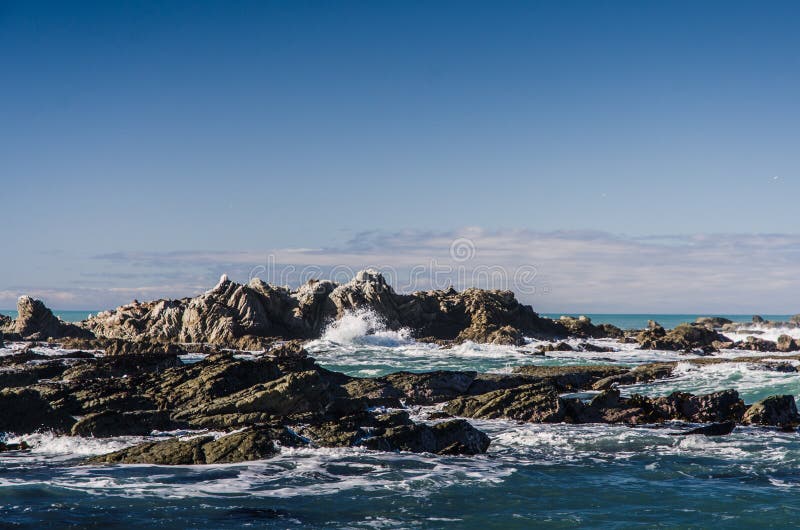 Dangerous sharp sea rocks stock image. Image of rocks - 43701207