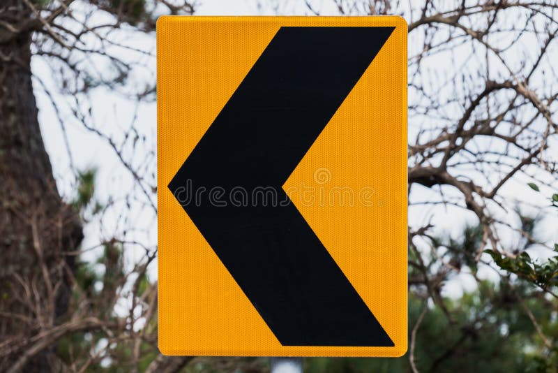 Dangerous Turn Left, Yellow Black Road Sign Stock Photo - Image of ...