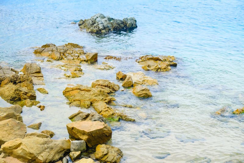 Dangerous Underwater Rock on Beach at Low Tide. Costa Brava, Spain ...