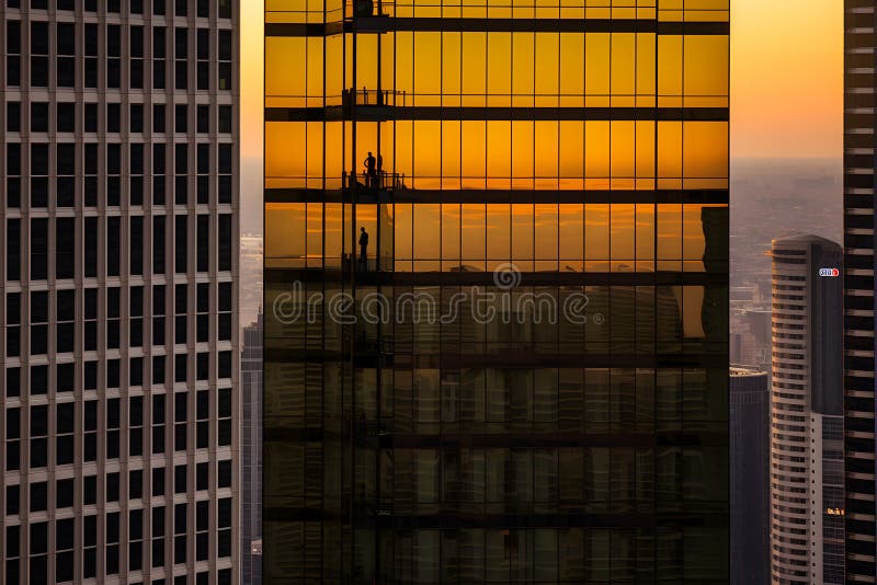 Dangerous Working of a Man on High Tower in the City with Skyscraper ...