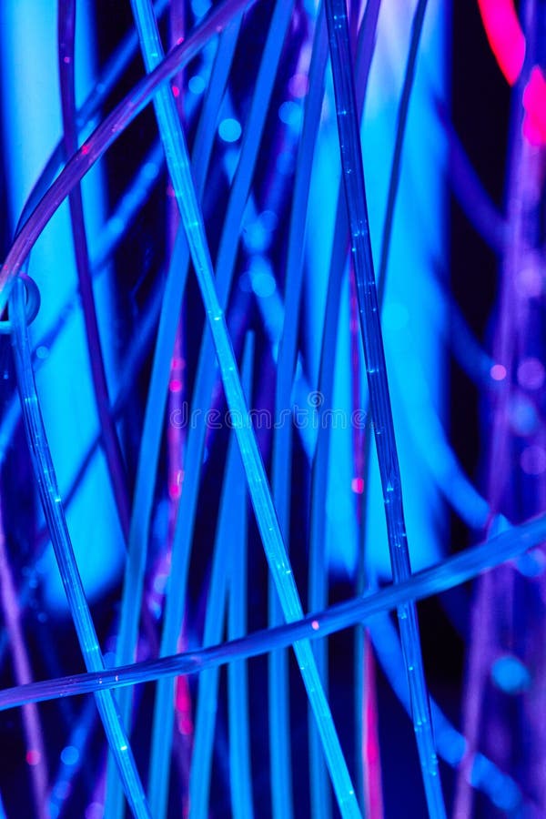 Dangling Blue Cables Glowing with Neon LED Lights Editorial Image ...