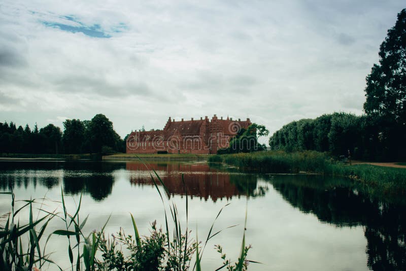 Danish castle reflection stock image. Image of plant - 205487057