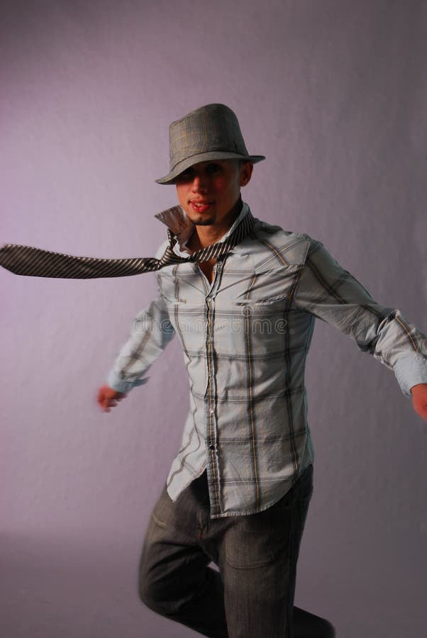 Dansend mannetje in plaid stock afbeelding. Image of dansen - 3642523