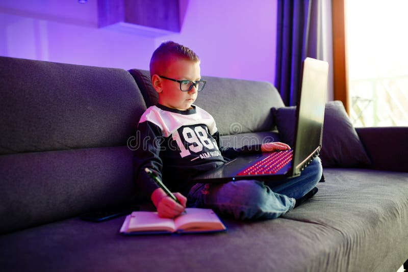 Danya S Boy Studies at Home on the Computer. Stock Photo - Image of ...