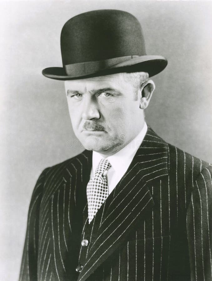 Dapper man in bowler hat stock photo. Image of confidence - 59792596