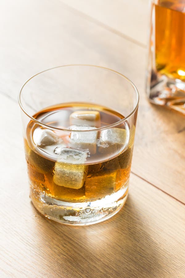 Dark Amber Bourbon with Whiskey Stones Stock Photo - Image of alcohol ...