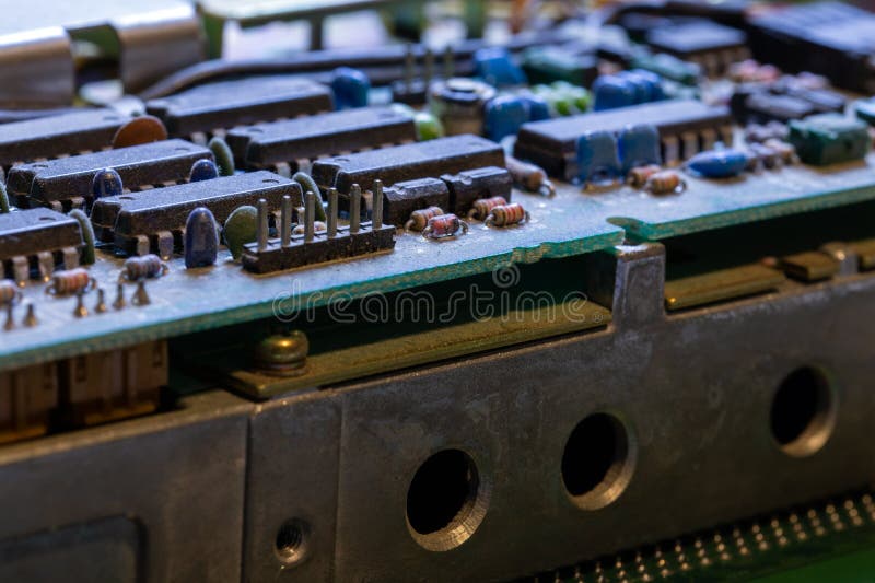 Dark Background of Old Electronic Circuit Board Closeup with Dus Stock ...