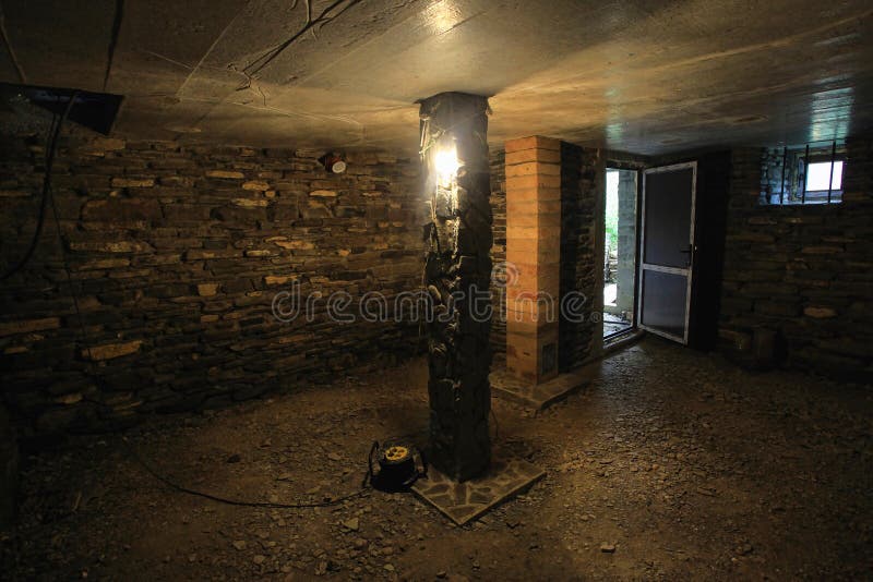 Dark basement with stone stock image. Image of abstract - 218980779