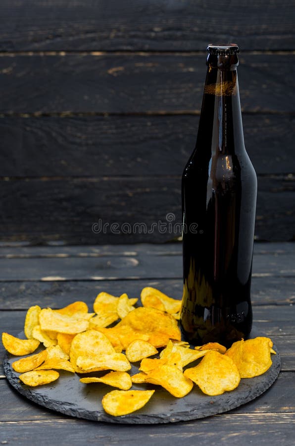 Dark Beer in a Bottle. Beer and Chips Stock Photo - Image of still ...